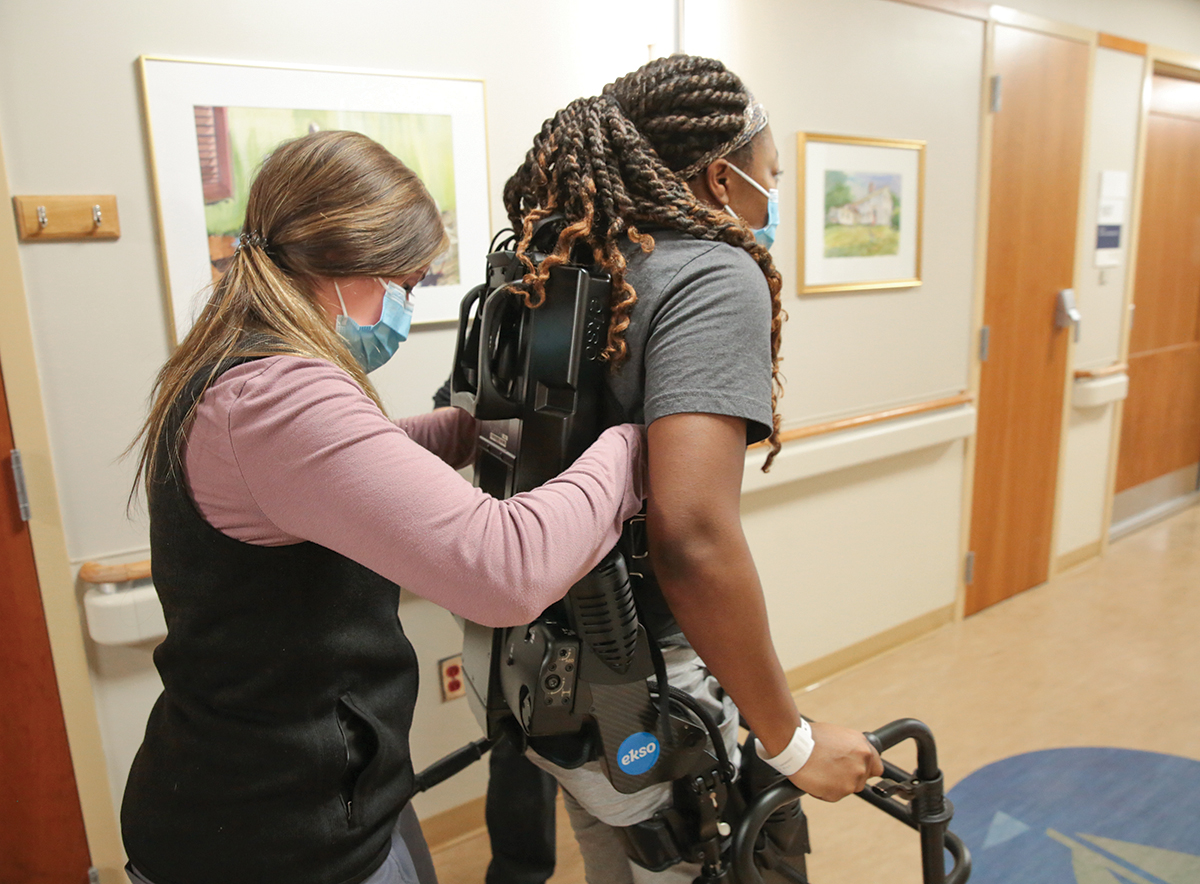 High-tech exoskeleton lending a hand, arms and legs